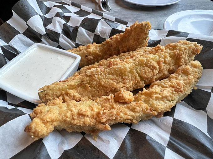 Crispy, golden-battered pickle spears that would make even a pickle skeptic reconsider their life choices. That ranch dip seals the deal.