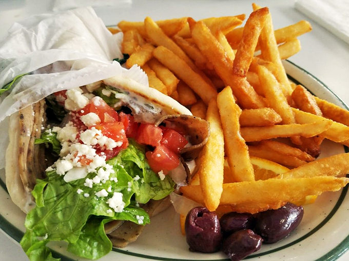 This gyro isn't just a sandwich, it's a Mediterranean vacation wrapped in warm pita, no passport required!