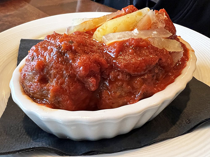 Holy meatballs, Batman! These saucy spheres of delight look ready to save your taste buds from a flavor crisis. No cape required!