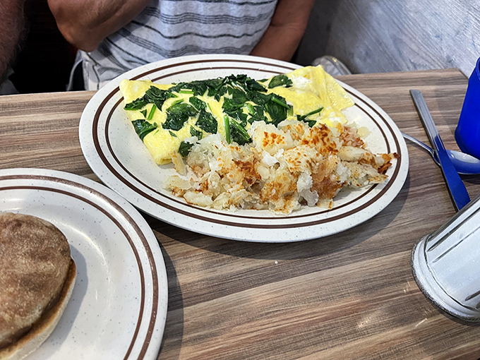 This omelet's got more folds than an origami convention, and twice the flavor. It's not just breakfast, it's an egg-sperience! Photo credit: Howard Moore
