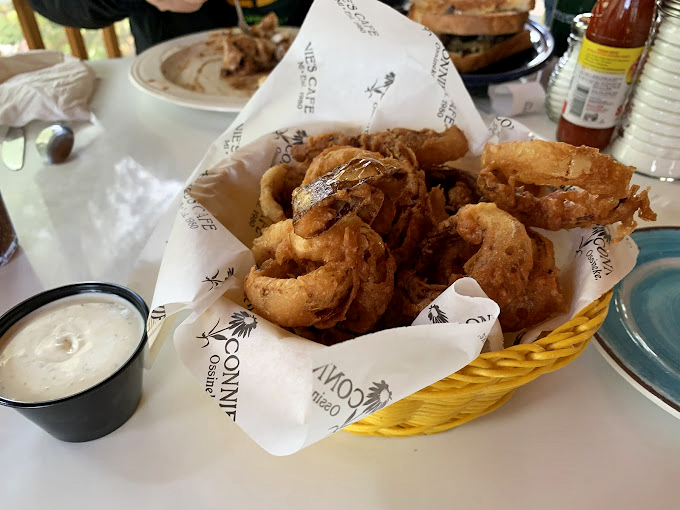 Holy onion rings, Batman! These golden hoops of happiness are crunchier than your old vinyl records and twice as addictive.