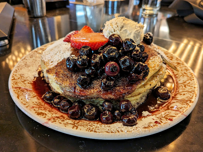 Pancakes that could make maple syrup jealous! These fluffy stacks are topped with a berry bonanza that'll have you singing "I Love Lucy" (you know, 'cause of the fruit).