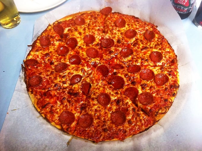 Pepperoni perfection! This pie could make even the most die-hard New Yorker question their loyalty. It's not just a pizza, it's a work of art.