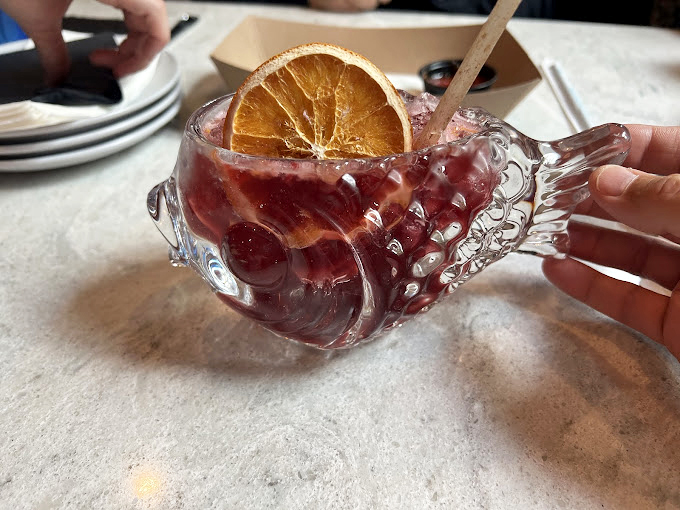 Sangria so pretty, it's almost too good to drink. Almost. This glass of garnet goodness is like Florida sunshine in liquid form. Photo credit: C S
