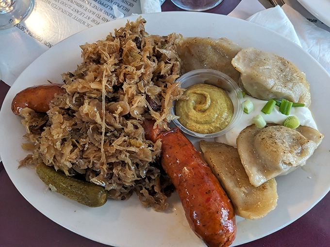 Sauerkraut that'll make you say "Holy cabbage!" This plate is a symphony of savory delights, with pierogi playing first fiddle. Photo credit: Brandon Kochkodin