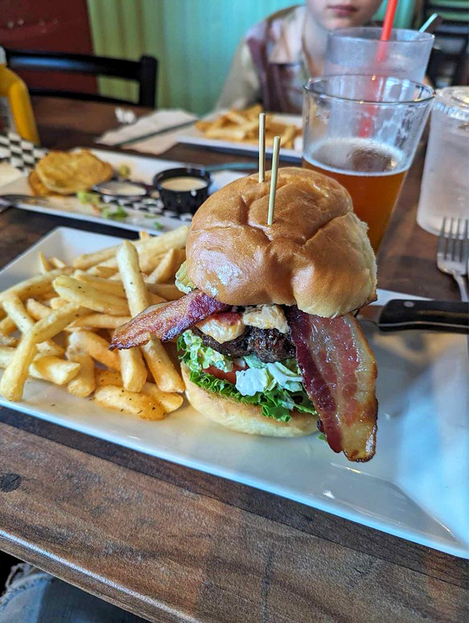 Behold the Tank Burger: a beefy behemoth that'll have you saying, "Houston, we have a delicious problem." Houston, we have a delicious problem.