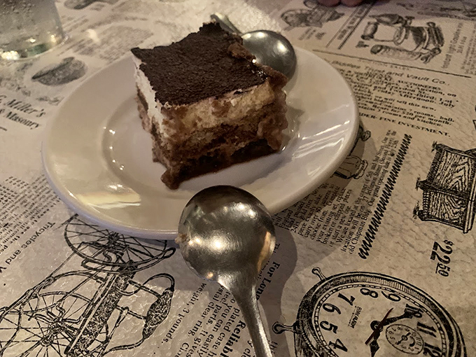 Behold, the star of the show: Nonna's legendary tiramisu. Layers of coffee-soaked heaven that'll make you want to hug the chef and ask for adoption papers.