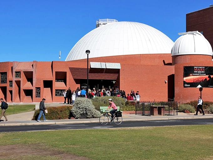 Brick-tastic space odyssey! Flandrau's architecture is what happens when Legos grow up and get a degree in astrophysics.