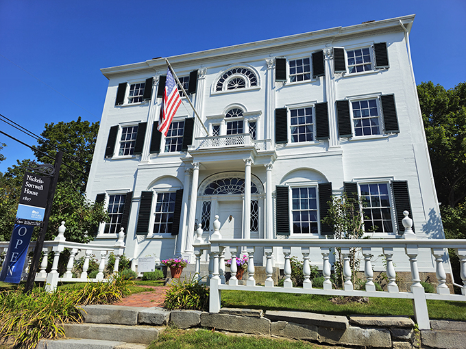 Old money whispers through every nook of this Federal-style gem. That staircase? Pure 19th-century selfie material.