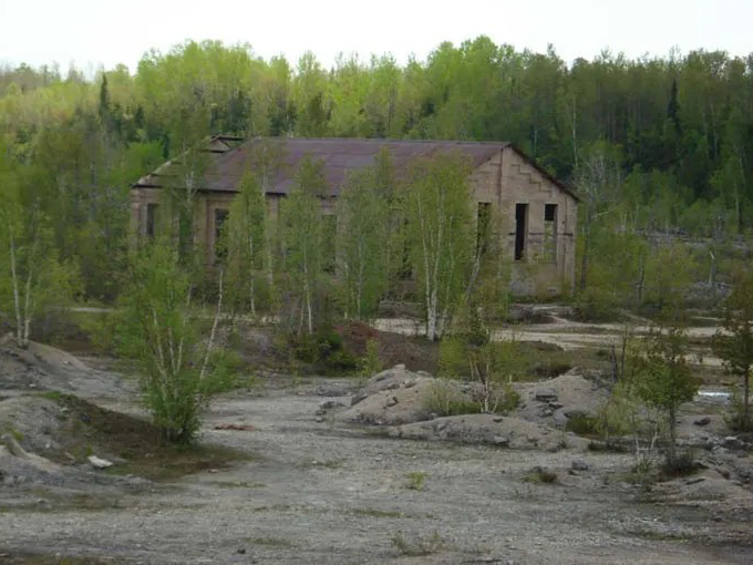 Nature's reclamation project in full swing. Fiborn Quarry's ruins blend seamlessly with the wild landscape. Photo credit: Gitche Gumee Agate and History Museum