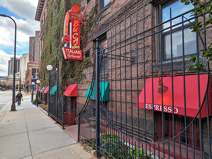 Mama mia! Buca's ivy-covered brick wall isn't just decor, it's a portal to family-style feasts and kitschy charm.