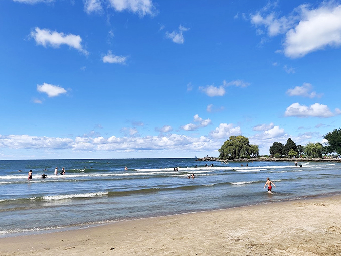City meets shore! Cleveland's skyline plays peekaboo with Lake Erie, creating an urban oasis that's pure Instagram gold.