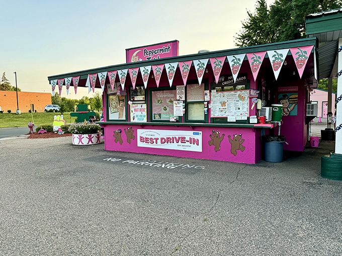 Pink paradise alert! This drive-in is more colorful than a Technicolor musical, serving up summer vibes with every twist cone.