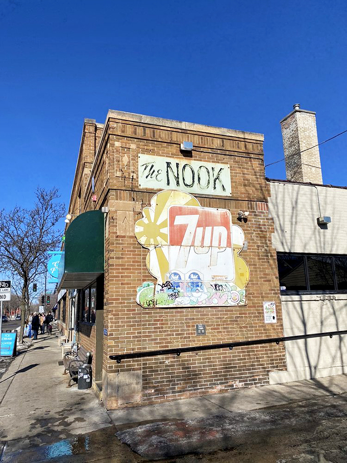 Burgers so good, they needed a mural! The Nook's 7-Up sign hints at refreshing pairings for their legendary stuffed patties. Photo credit: Tyler M.