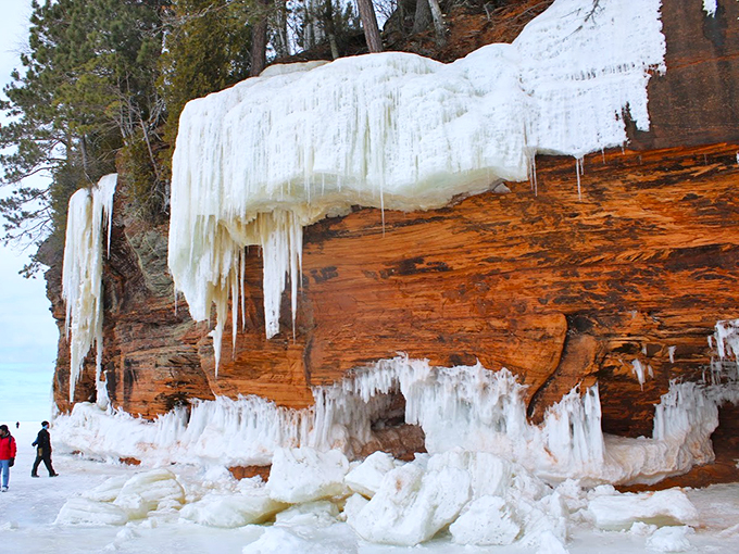 Icicles on steroids! Nature's chandeliers hang from rust-colored cliffs, creating a frozen wonderland that puts ice hotels to shame.