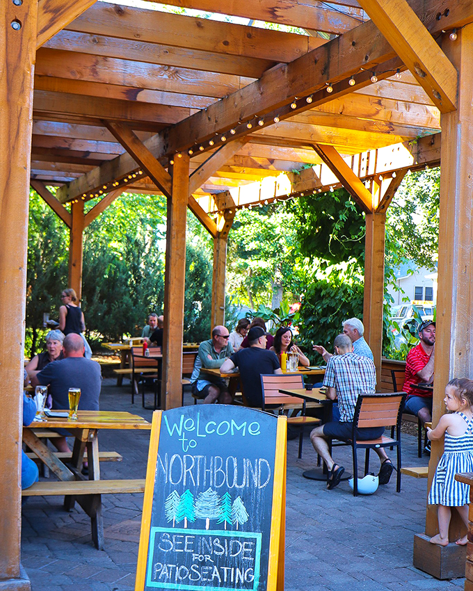 Chalkboard charm meets winter wonderland. Northbound's snowy patio scene is like a Norman Rockwell painting, but with better beer. Photo credit: Northbound Smokehouse & Brewpub