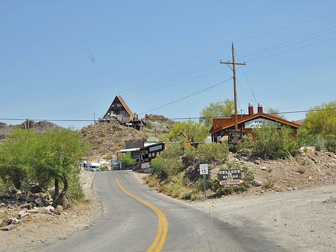 Welcome to Oatman, where "Watch for Crossing Animals" signs aren't just for decoration. Burro crossing ahead!
