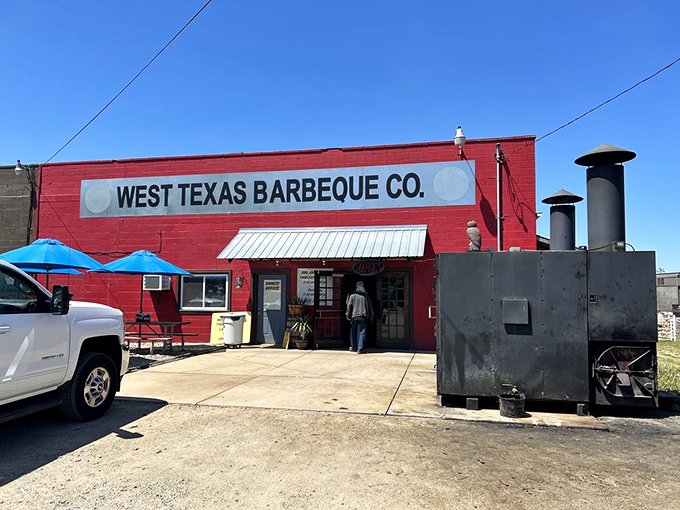 Red alert! This unassuming building houses barbecue so good, it should come with a warning label. Prepare for a flavor explosion!