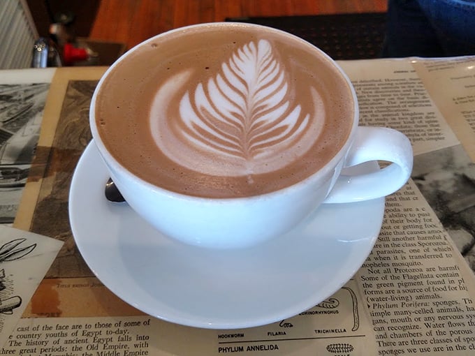 Forget judging a book by its cover&mdash;judge this cafe by its coffee art. This latte's so pretty, you almost don't want to drink it. Almost.