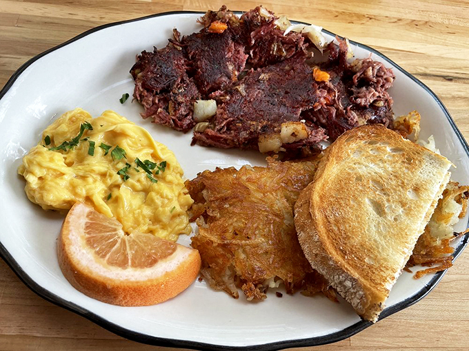 Scrambled eggs as fluffy as clouds, paired with hash that's achieved breakfast immortality. That grapefruit wedge adds a perfect citrus punch.