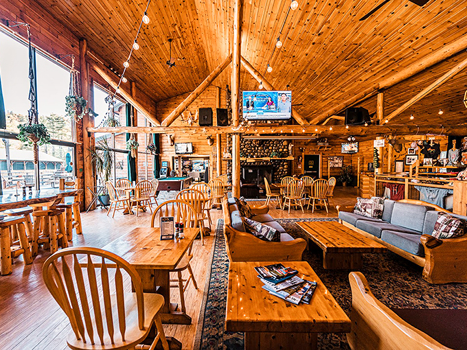 Step into this rustic time machine, where every log and beam tells a tale of Maine's great outdoors.