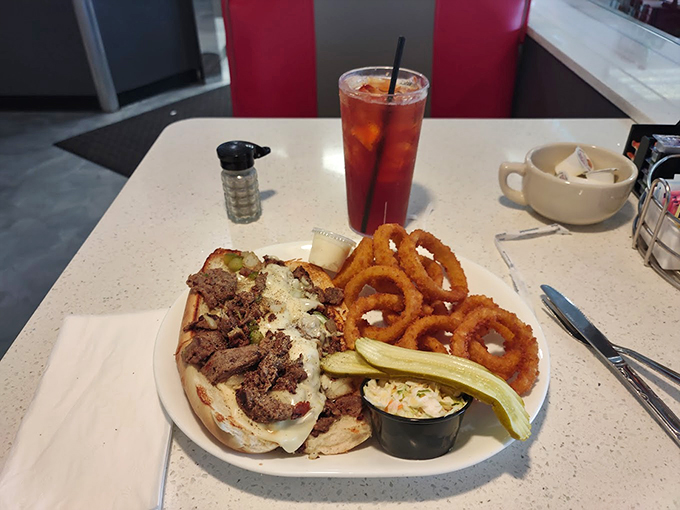 Behold, the sandwich that launched a thousand food comas! This gyro is so packed, it's practically bursting at the seams. Napkins: mandatory.