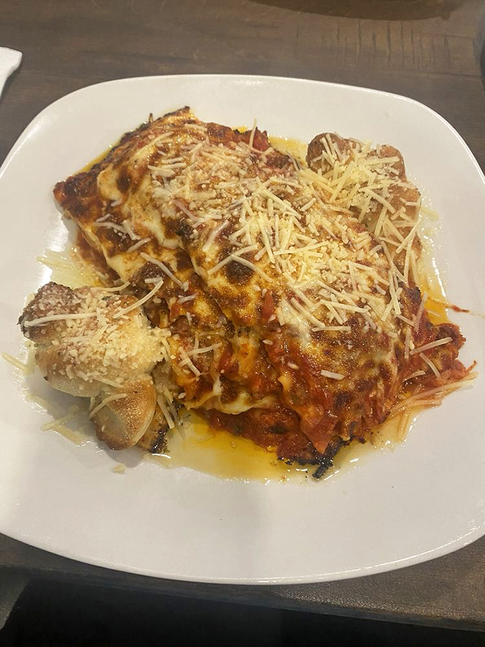 Layers upon layers of pasta perfection. It's like a warm, cheesy hug for your taste buds. Garfield would definitely skip his diet for this one.