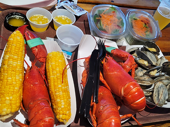The ultimate seafood spread! It's like Neptune himself packed your lunchbox, complete with corn-on-the-cob and melted butter.