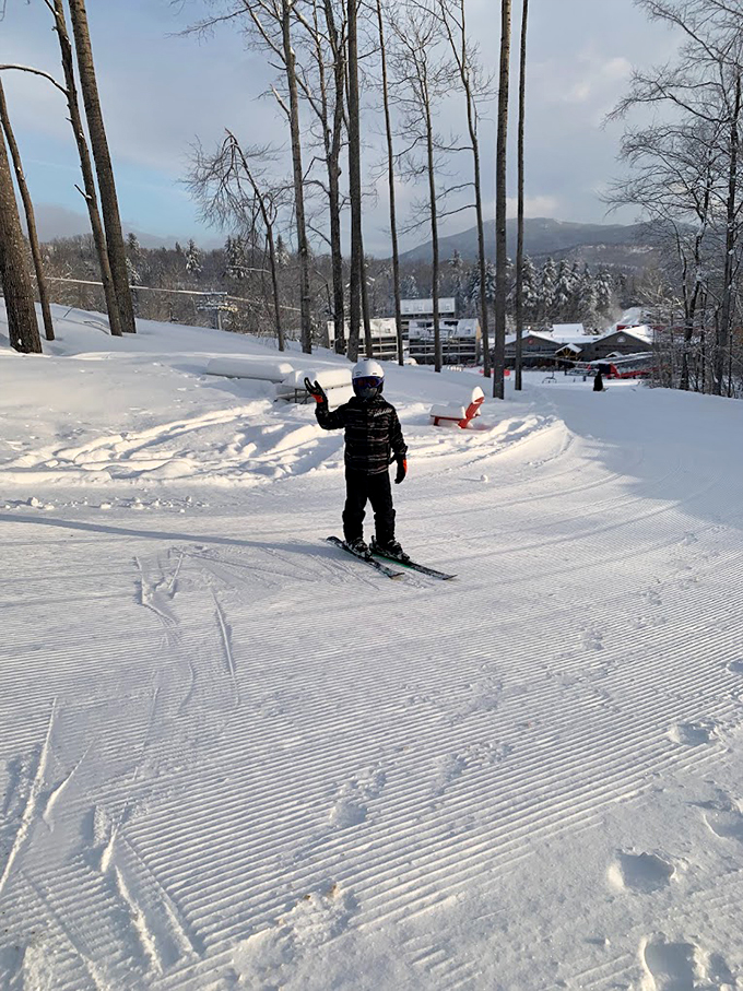 Carving up the mountain like a Thanksgiving turkey. This lone skier is living the dream on a perfectly groomed trail.