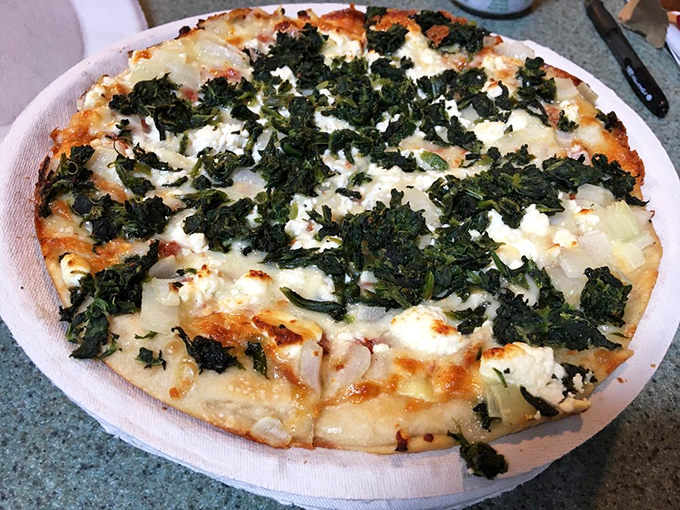 Kale yeah! This Greek-inspired pizza is so fresh, it might just start a philosophical debate.