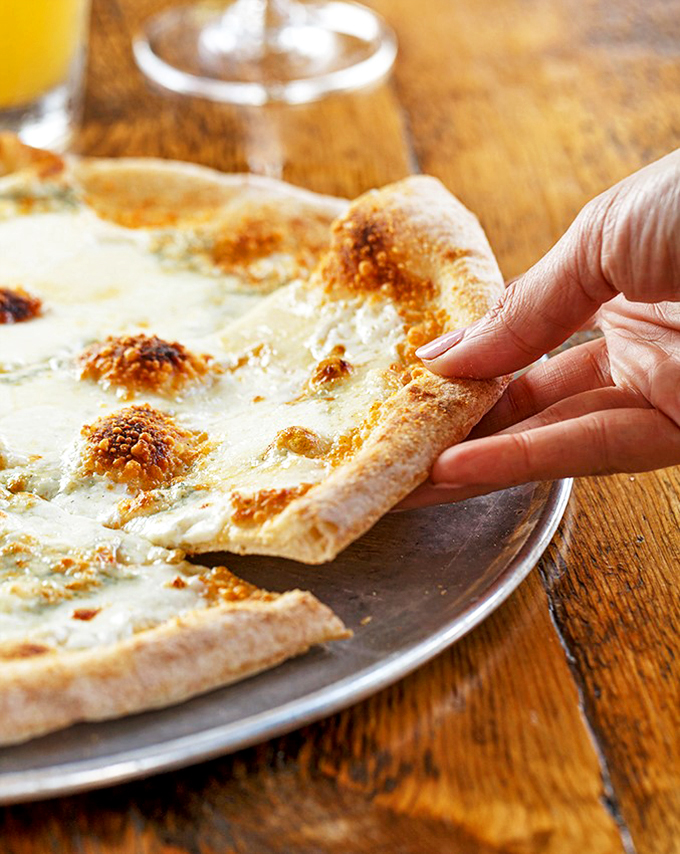 A cheese lover's dream come true, with local craft beer standing by. Because one type of cheese is never enough.