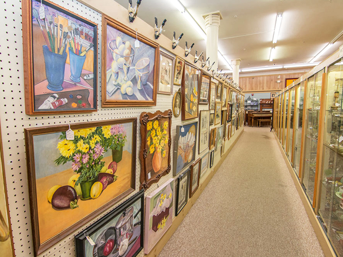 A gallery-worthy collection of vintage paintings lines this corridor, each frame telling its own story of artistic heritage.