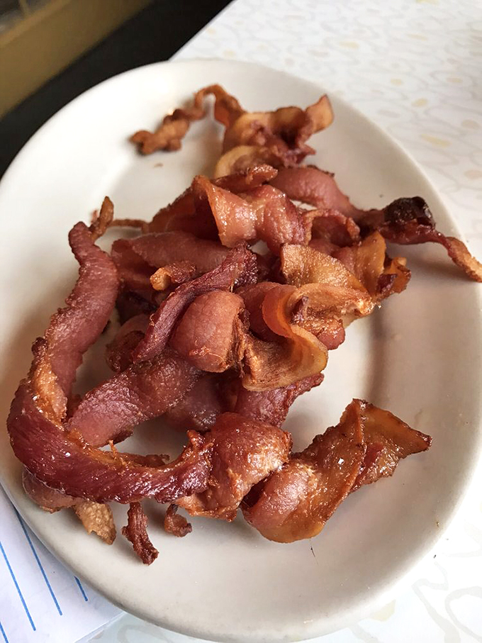 Bacon so crispy, it practically sings when you bite into it. A salty serenade for your taste buds.