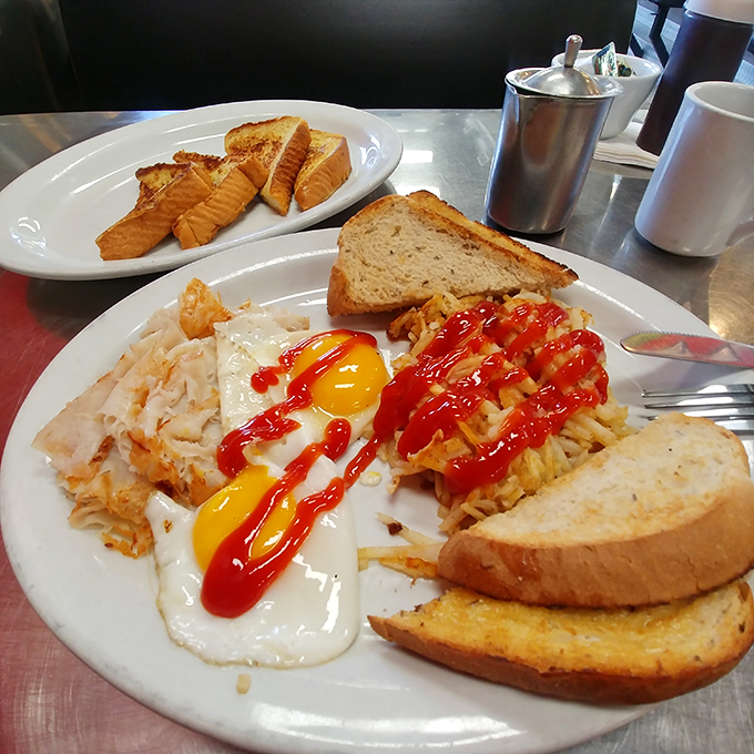 Breakfast of champions, or champion of breakfasts? This plate's got more colors than a Bob Ross painting, and twice the happy little accidents.