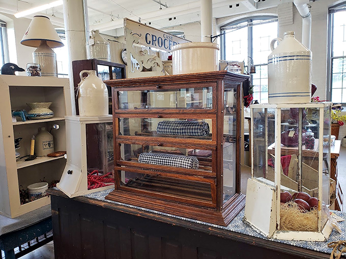 This vintage display cabinet could tell tales of countless shop windows, now showcasing new treasures for modern collectors.