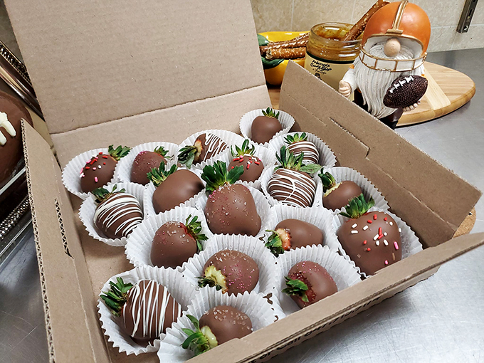 Chocolate-dipped strawberries: nature's candy gets a makeover! These beauties are dressed to impress, like tiny tuxedoed fruits ready for a gala.