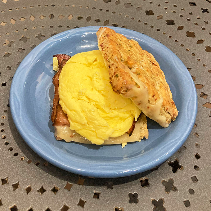 Meet the sandwich that puts all others to shame. This country-style beauty on a cheddar chive scone is what breakfast dreams are made of.