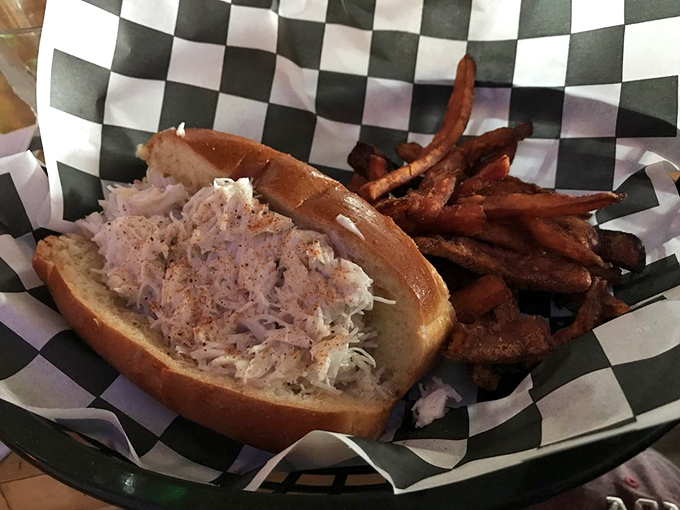 This isn't just lunch - it's a love letter to the ocean, served on a toasted roll with a side of pure joy.