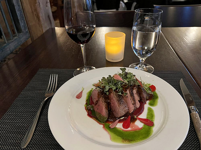 The duck breast arrives like a sunset on a plate, perfectly seared and ready for its close-up. Photo credit: Patricia S.