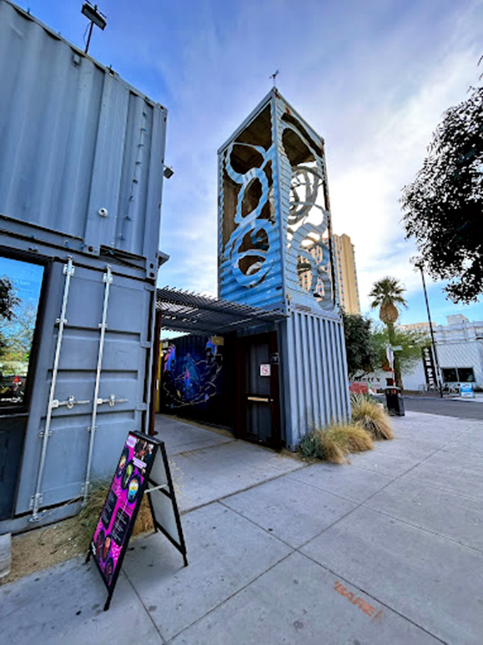 Art meets architecture in this striking entryway, where industrial steel gets a creative makeover with intricate geometric designs.