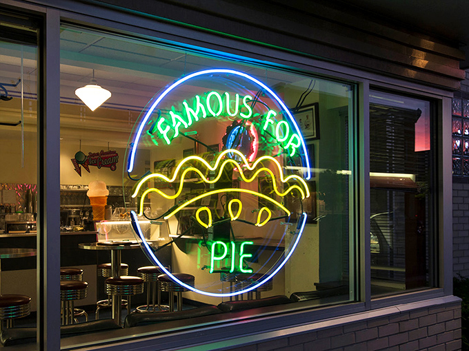 When neon speaks the truth! This sign isn't just illuminating the night; it's a beacon for pie lovers and a siren song for sweet tooths everywhere.