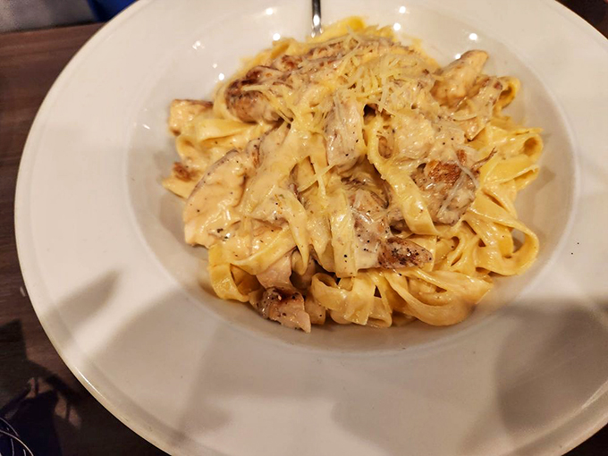 When pasta meets perfectly grilled chicken in a sauce so creamy, you'll want to frame the empty plate.