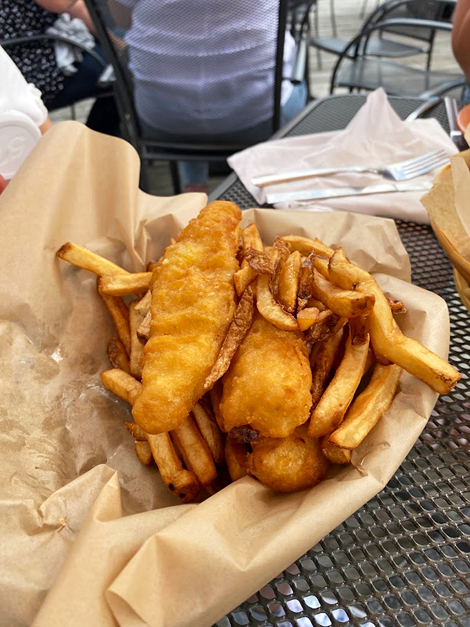 This isn't just fish and chips - it's a masterpiece of crispy, flaky perfection that would make Neptune himself jealous.