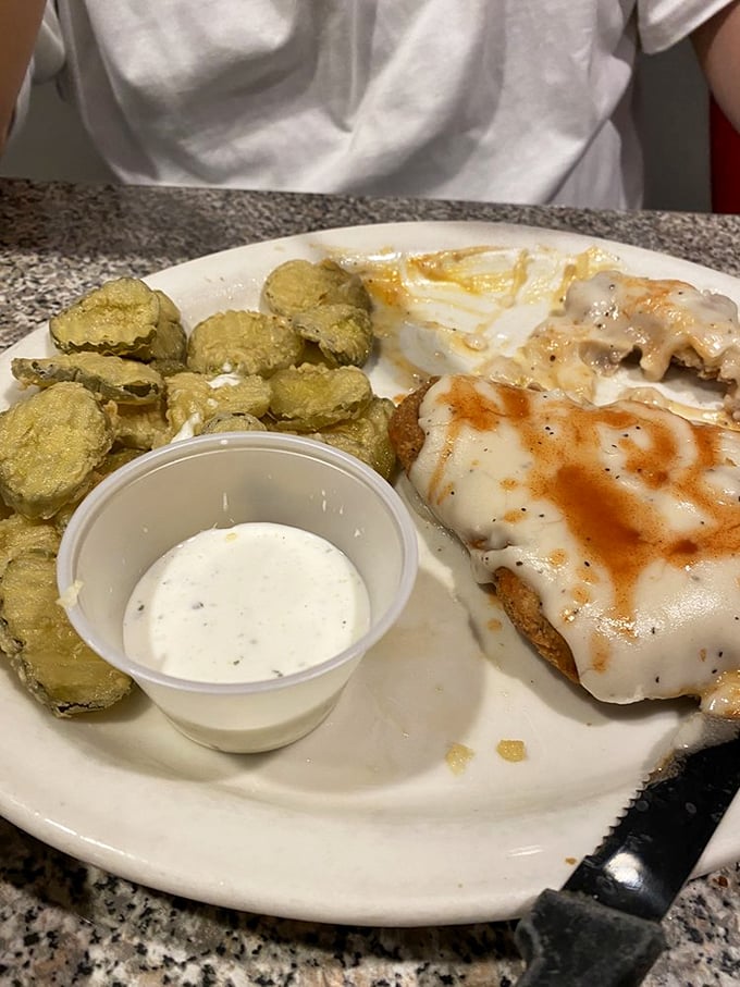 Golden-crispy fried pickles and country-fried steak: A plate that proves comfort food knows no boundaries. Photo credit: Elizabeth S.