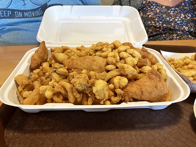 A golden treasure chest of fried delights that would make Neptune himself trade his trident for a fork.