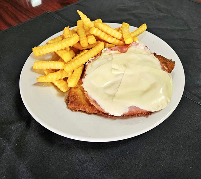 Cheesy, hammy, crispy goodness! This schnitzel is like a warm hug from a lederhosen-clad friend.