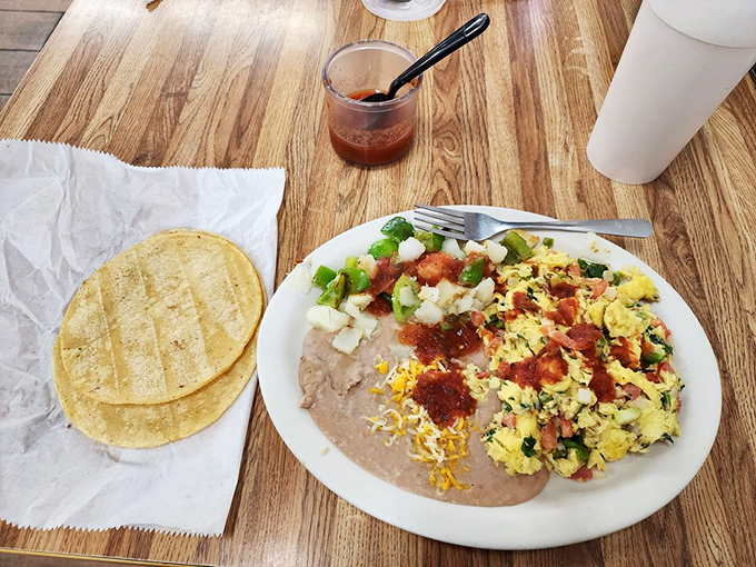 Eggs-cellent choice! This colorful plate is like a fiesta for your taste buds, no pi&ntilde;ata required.