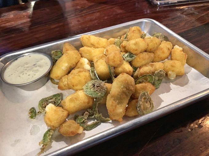 Spice up your life! These jalape&ntilde;o cheese curds are like a fiesta in your mouth, complete with a creamy ranch sidekick. Photo credit: Photo credit: Marie P.