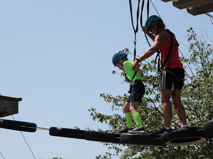 Crossing tire bridges becomes an art form - part balance beam routine, part "don't look down" meditation practice. Photo credit: Sue Driscoll