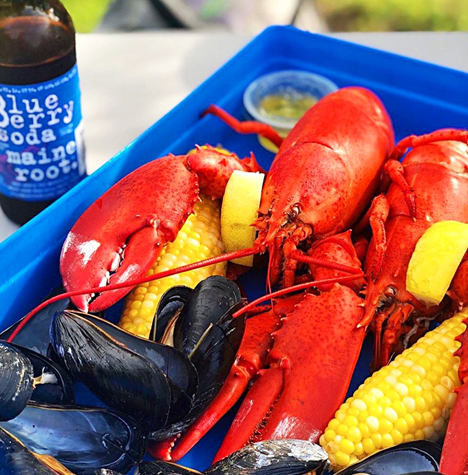 Fresh lobsters and corn on the cob share space with mussels in this seafood feast that screams "summer in New England."